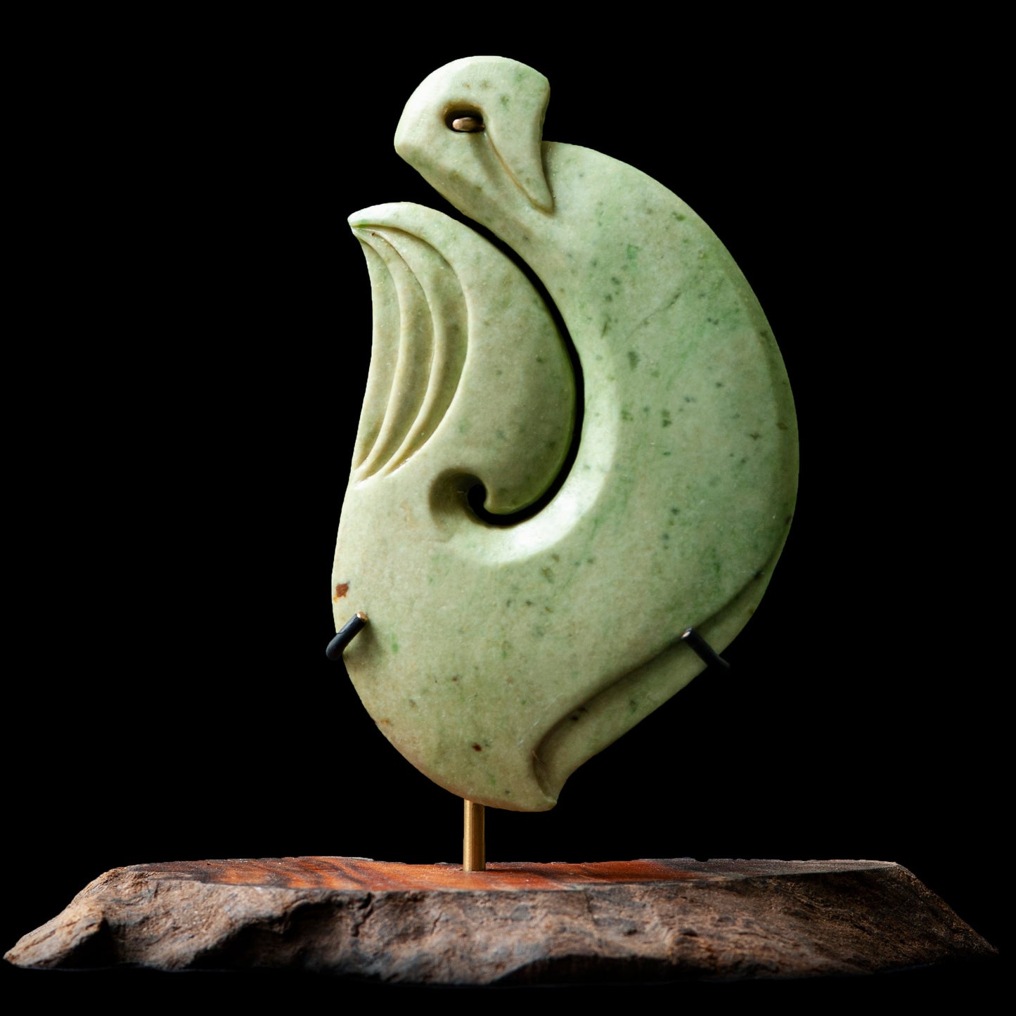 Pounamu Matau Sculpture on stand by Alex Sands - Buy Kiwi Direct